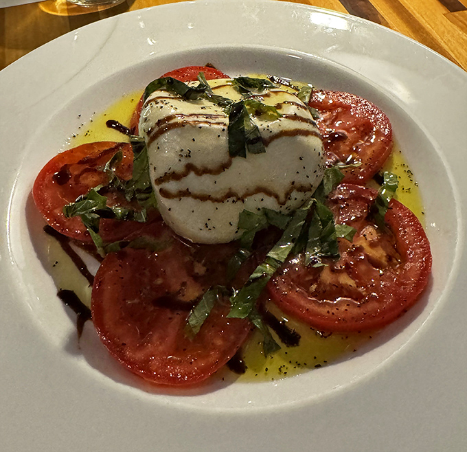 A proper Caprese salad that proves sometimes the simplest combinations&mdash;ripe tomatoes, fresh mozzarella, basil, and good olive oil&mdash;are culinary perfection.