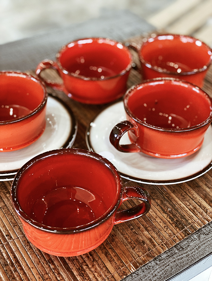 Vibrant coral cups that make morning coffee feel like a celebration. Everyday ceramics with extraordinary personality for your kitchen collection.