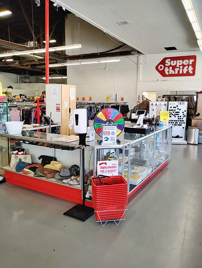 The checkout counter&mdash;final gateway between thrift store dreams and reality, complete with impulse-buy treasures and a spinning wheel of additional discounts.