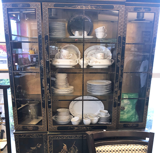 This ornate china cabinet doesn't just display dishes&mdash;it showcases the elegant dining history of generations past, ready for a revival in a modern home.