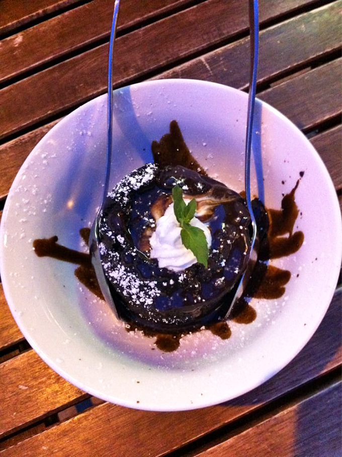 A chocolate dessert so decadent it deserves its own fan club, crowned with whipped cream and mint like it's food royalty&mdash;which it absolutely is.