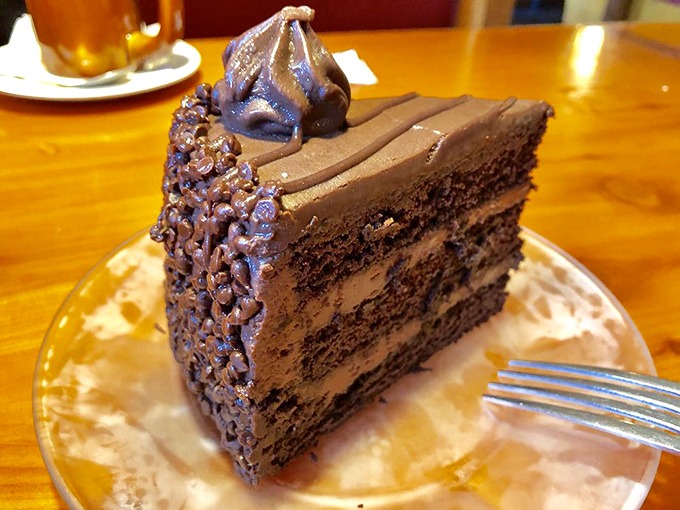 Chocolate cake layered with such precision it could teach architecture students a thing or two about structural integrity.