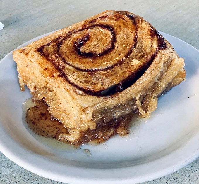 This cinnamon roll isn't just breakfast, it's an event &ndash; layers of buttery dough and spiced sugar swirls melting together in sweet, gooey harmony.