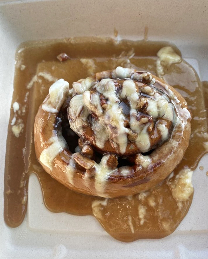 This cinnamon roll isn't just dessert disguised as breakfast &ndash; it's a gooey, warm hug on a plate that makes everything right with the world.