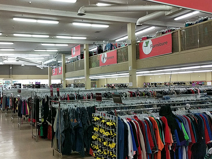 A rainbow of possibilities hangs in perfect order, proving that sustainable fashion doesn't mean sacrificing variety or vibrant color choices.