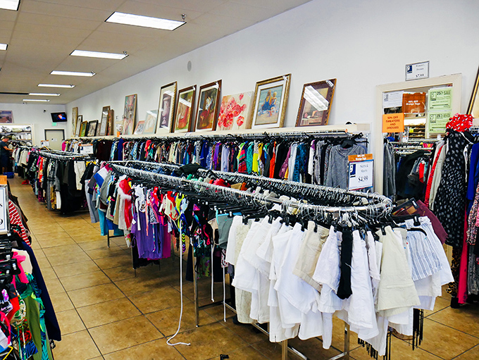 The clothing section stretches toward infinity. Each hanger holds a possibility &ndash; perhaps that perfect white blouse you've been searching for forever.