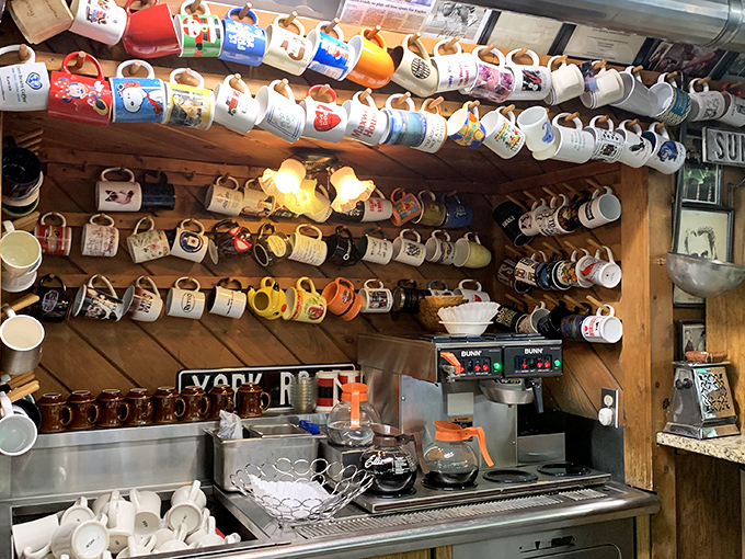The coffee station stands ready for battle, with enough mugs to caffeinate a small army.
