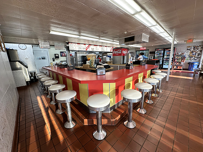 The counter where magic happens&mdash;complete with classic diner stools that invite you to spin exactly once before settling in for a meal you won't forget.