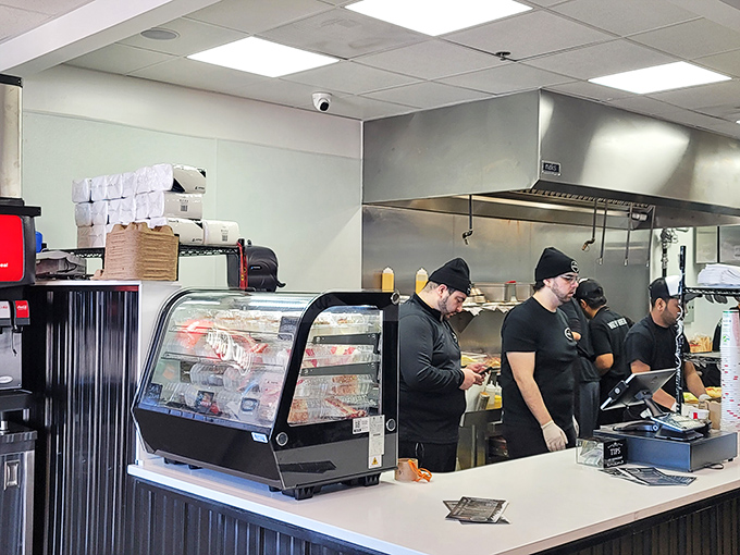 The counter where dreams come true. Behind that glass case lies the promise of a meal that will haunt your taste memories for days to come.