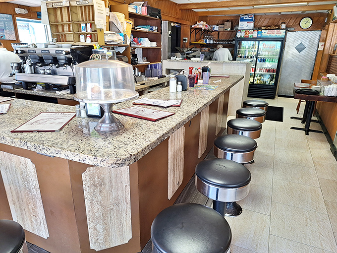 The counter seats, where solo diners become part of the family, one cortadito at a time.