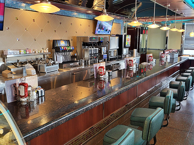 The counter where magic happens - where solo diners find community, and where the coffee is always just seconds away from being refilled.