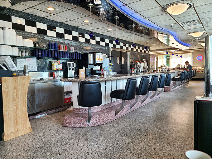 Counter seating: where solo diners become regulars and servers remember your coffee preferences after just one visit. Diner magic at its finest.