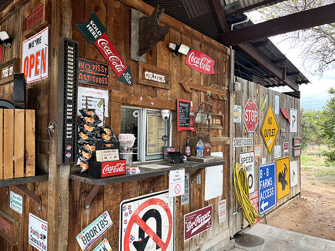 Where the magic begins: this humble counter has launched countless food dreams. The "No Pissy Attitudes" sign isn't just decor&mdash;it's a philosophy.