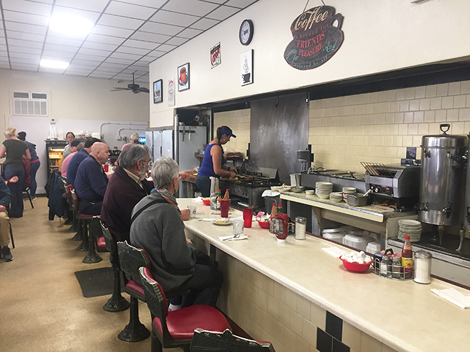 Counter seating: where breakfast becomes theater and regulars become family. The best seats in the house for morning entertainment that doesn't require tickets.