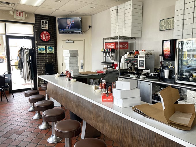 The counter where breakfast dreams come true, complete with swivel stools that make everyone feel like they're eight years old again.