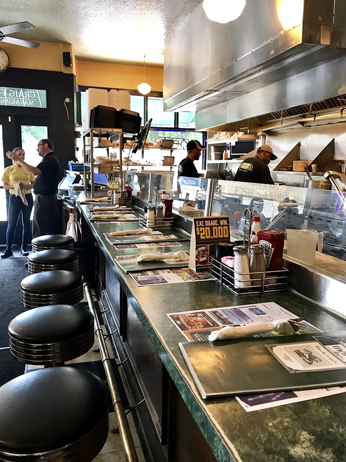 Where the magic happens—Metro Diner's counter seating offers front-row tickets to the culinary show. Dinner and a show, diner-style.