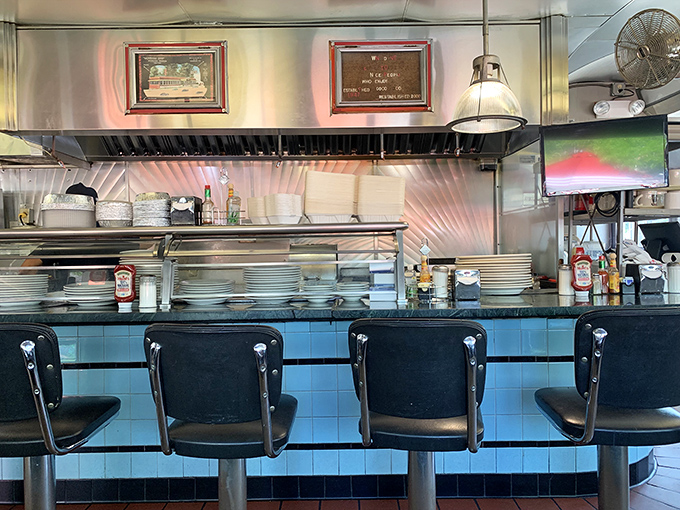 The counter seats&mdash;where solo diners become regulars, and the theater of short-order cooking unfolds before your eyes like a delicious Broadway show.