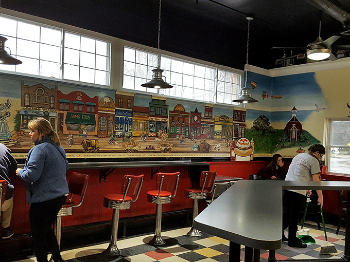 The counter seating and charming mural create the perfect backdrop for the kind of meal that makes you instantly start planning your return visit.
