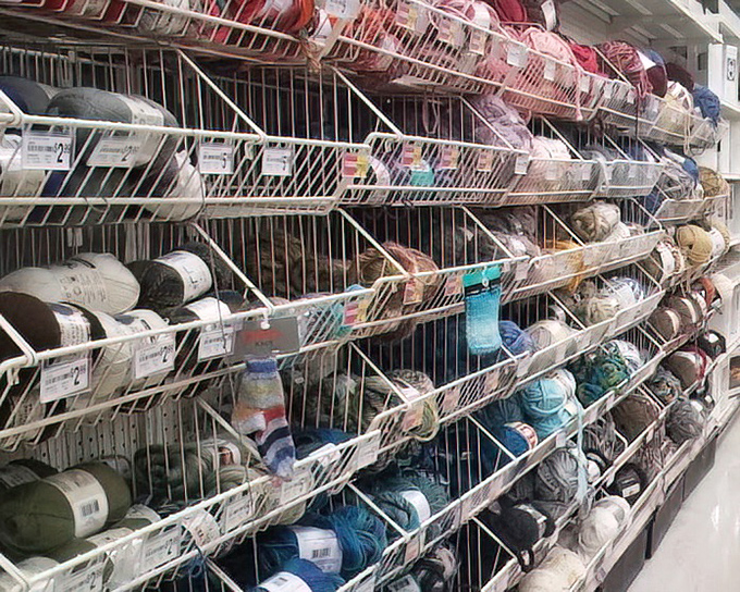 Craft supply aisles that whisper possibilities to your creative side. Each skein of yarn contains potential masterpieces and unfinished projects.