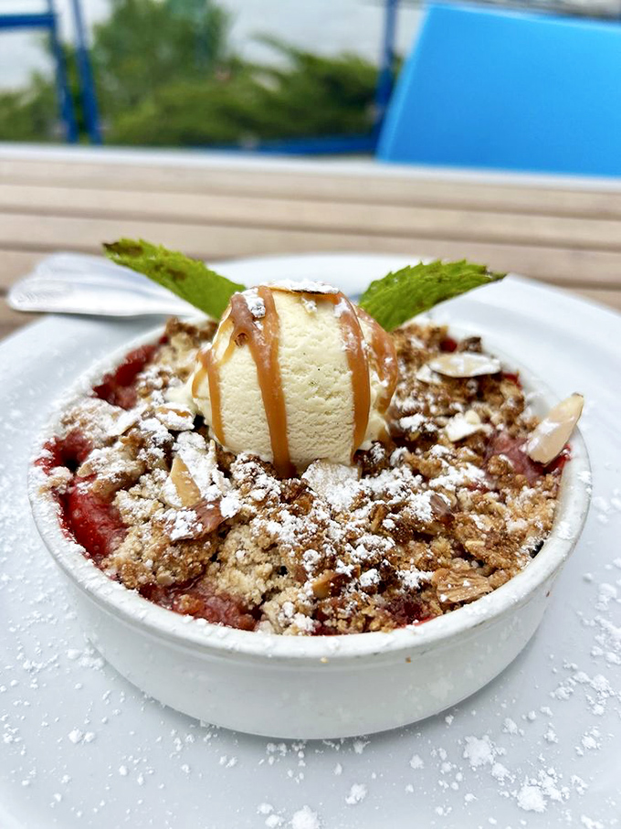 This isn't just dessert&mdash;it's the final act in a coastal culinary performance. Warm fruit, crumbly topping, and ice cream melting into sweet surrender.