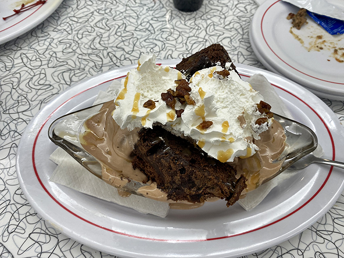 Chocolate cake with whipped cream&mdash;because sometimes the perfect ending to your meal is actually a beginning to something wonderfully indulgent.