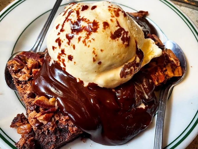 Bread pudding with chocolate sauce and ice cream&mdash;the holy trinity of dessert that makes you consider ordering seconds before finishing firsts.