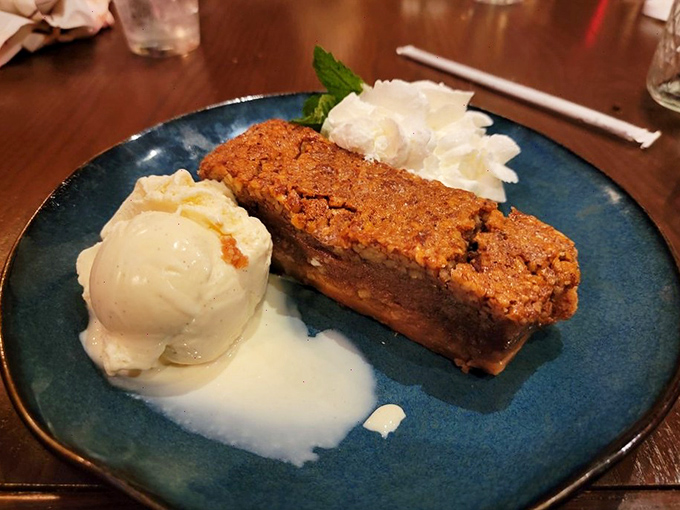 Pecan pie that makes you understand why people write songs about Southern desserts, served with ice cream that's melting with anticipation.