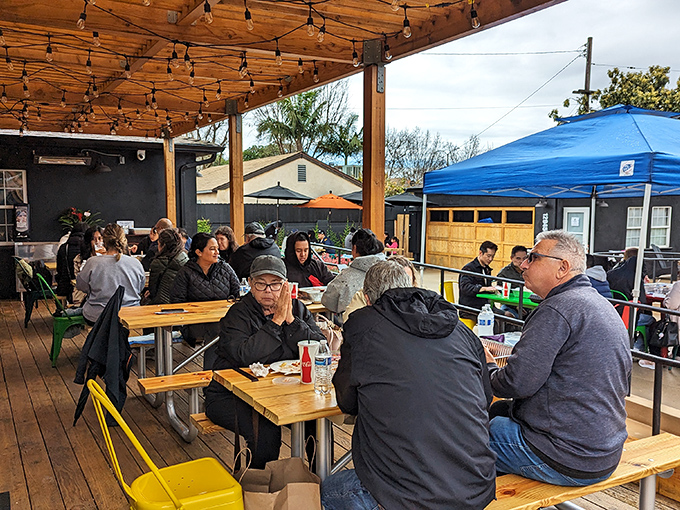 The universal language of barbecue brings people together. These diners aren't talking much&mdash;their mouths are otherwise occupied.