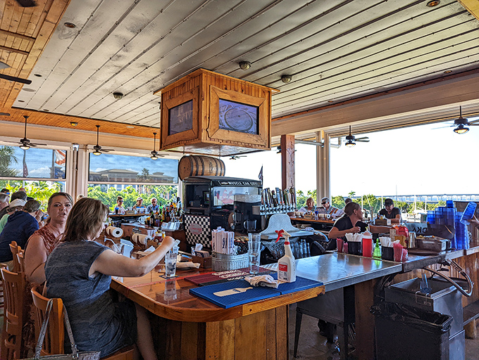 The outdoor bar area&mdash;where cold drinks, harbor views, and Florida breezes combine to create the perfect excuse to extend your lunch into dinner.