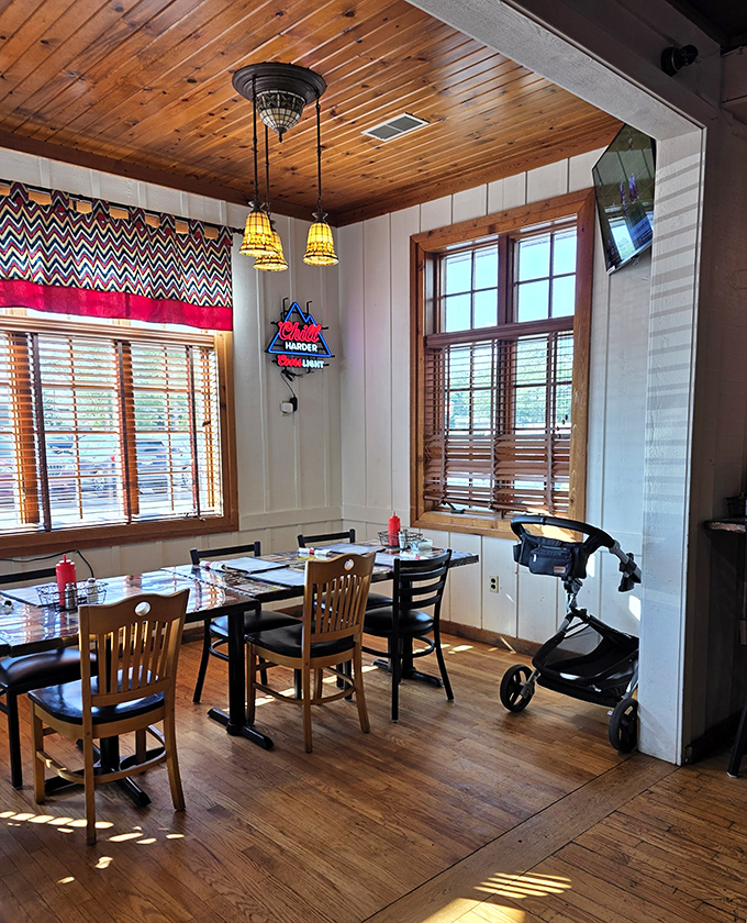 Sunlight streams through wooden blinds onto tables ready for the next round of happy diners. This isn't just a restaurant&mdash;it's where memories are made between bites.