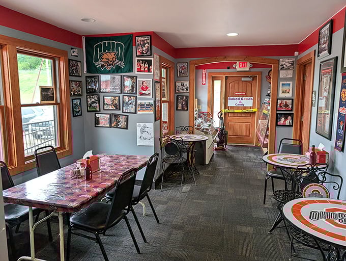 Where every table feels like the 50-yard line. This dining area's wall-to-wall Buckeye memorabilia creates the ultimate fan experience.