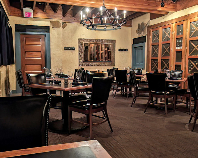 The dining room's warm woods and circular chandeliers create an atmosphere that says "special occasion" without shouting it.