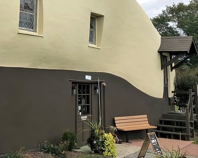 The side entrance proves that even giant shoes need practical considerations like actual doors that humans can use.