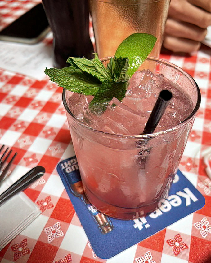 That cocktail garnish looks fresher than a morning garden, ready to make any meal memorable.