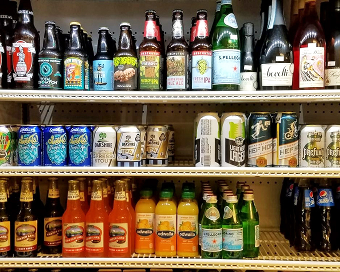 The drink selection proves they understand that great food deserves worthy liquid companions. From craft sodas to local brews, hydration with intention.