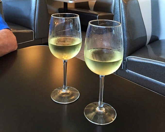 Two glasses of chilled white wine &ndash; because sometimes breakfast extends into lunch, and sometimes lunch deserves a celebration. 