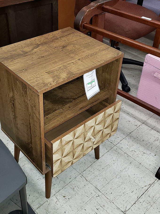 This mid-century inspired nightstand with geometric drawer front would cost ten times more at a trendy furniture boutique. Score!