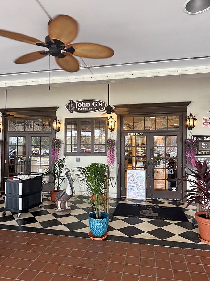 An entrance that feels like the gateway to comfort food paradise. Those hanging plants aren't just decoration—they're the green carpet for your culinary journey.