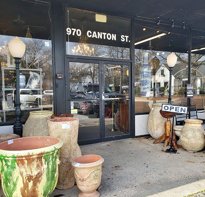 The welcoming entrance at 970 Canton Street, where terracotta planters stand guard like sentinels of style. First impressions that promise treasures within.