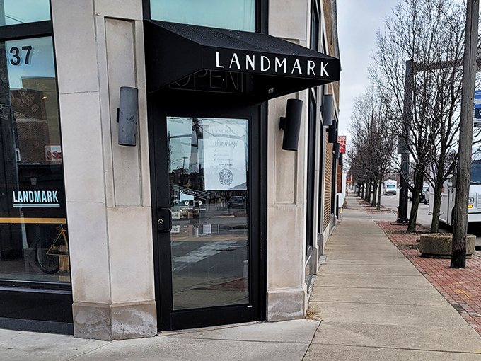 The corner entrance beckons like an old friend who knows exactly what you need after a long day—comfort, smoke, and a side of Cleveland charm.