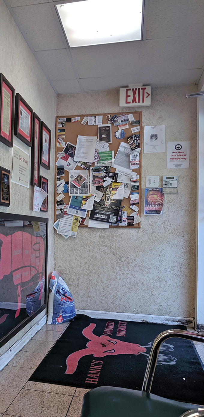 A bulletin board plastered with community notices and a branded mat&mdash;the kind of authentic touches that tell you this place is woven into the neighborhood fabric.