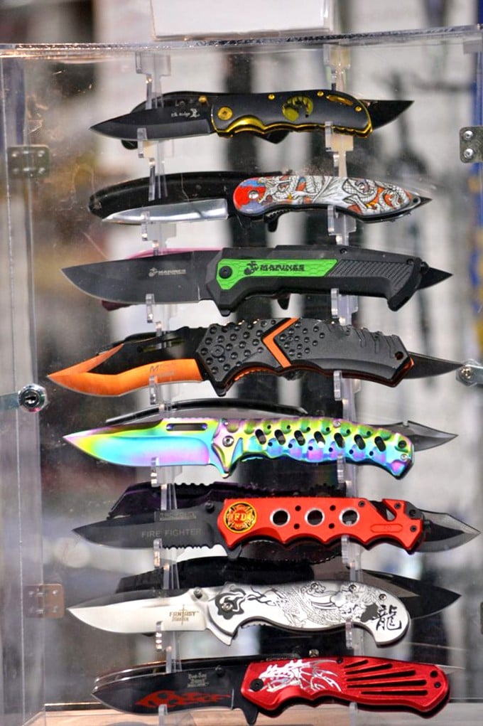 Pocket knives displayed like fine jewelry&mdash;practical tools transformed into collectible art pieces with personality to spare.