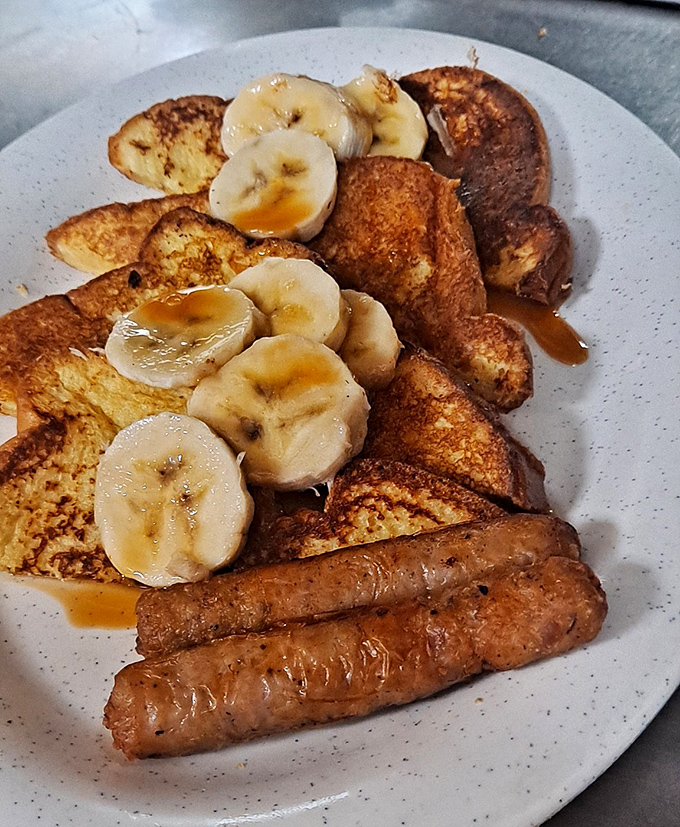 French toast that makes you question why you'd eat anything else for breakfast. Those bananas aren't garnish &ndash; they're co-stars in this morning masterpiece.