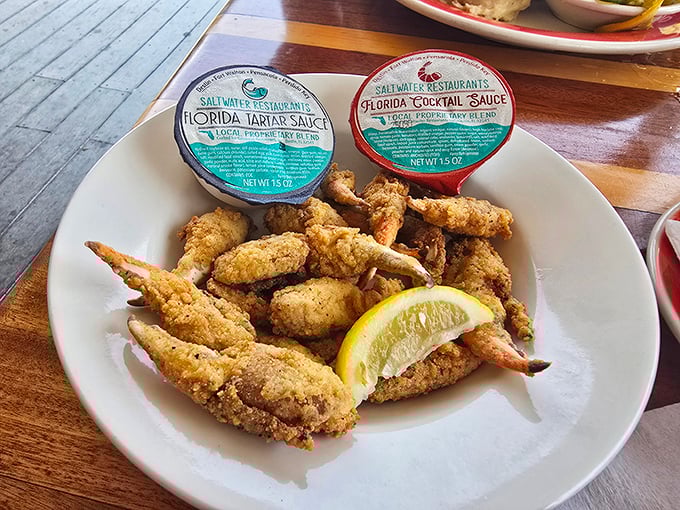 Fried crab claws so perfectly golden, they deserve their own spot on Florida's highlight reel. The accompanying sauces are merely supporting actors.