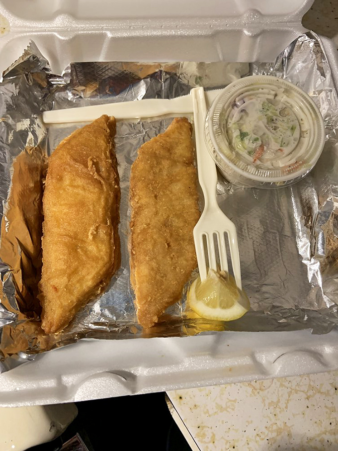 Golden-fried fish that would make any seafood lover swoon, served simply with lemon and dipping sauce. Sometimes simplicity is the ultimate sophistication.