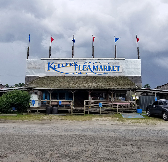 The official welcome wagon! Keller's iconic sign with fluttering flags announces that you've arrived at the mothership of secondhand treasures and first-rate discoveries.