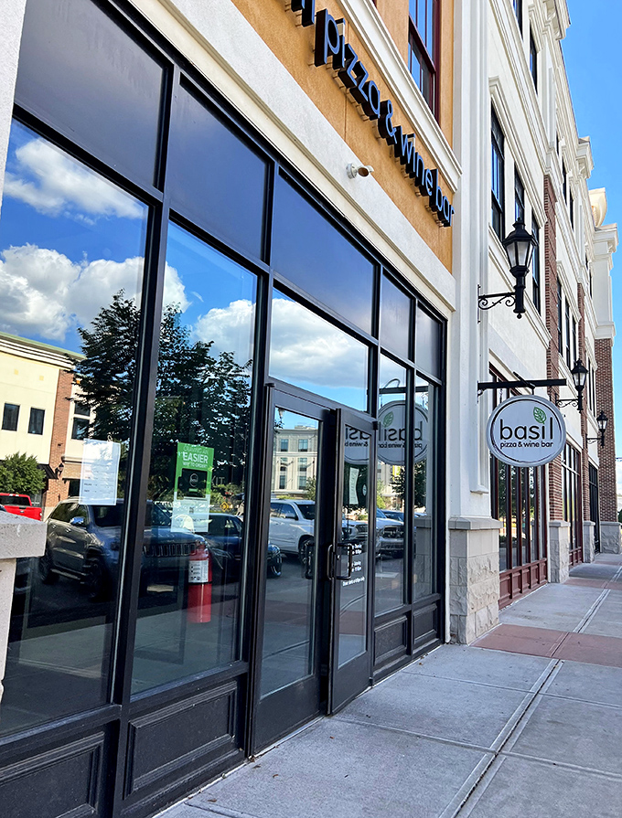 Sunlight plays off the expansive windows, reflecting Perrysburg's charm while hinting at the culinary treasures waiting inside Basil's doors.