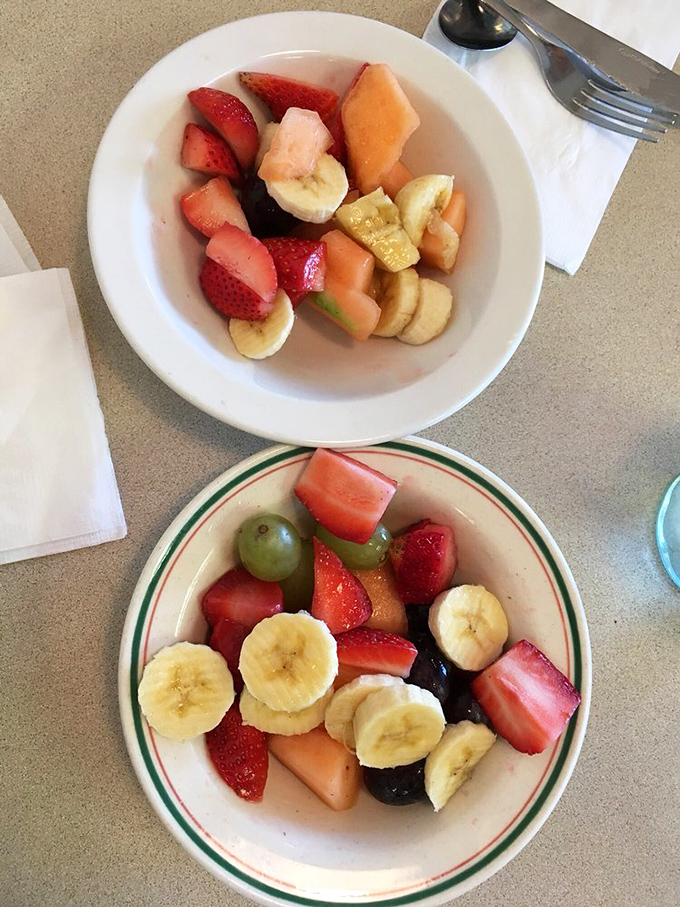 Fresh fruit that proves someone in the kitchen cares about balance. After all, you need something healthy to contemplate while waiting for your pancakes.