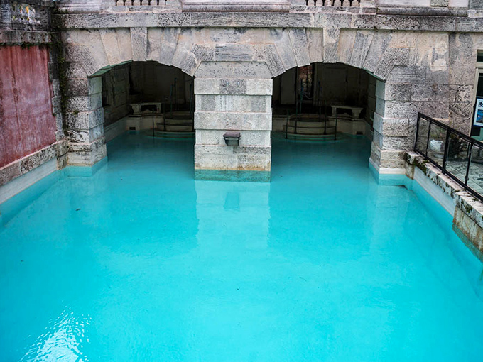 The swimming grotto where Miami meets ancient Rome. That impossibly blue water has been tempting visitors to break the "no swimming" rule for decades.