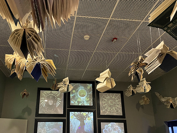 Books don't just contain worlds at Otherworld &ndash; they become worlds, suspended in mid-air like knowledge taking flight.